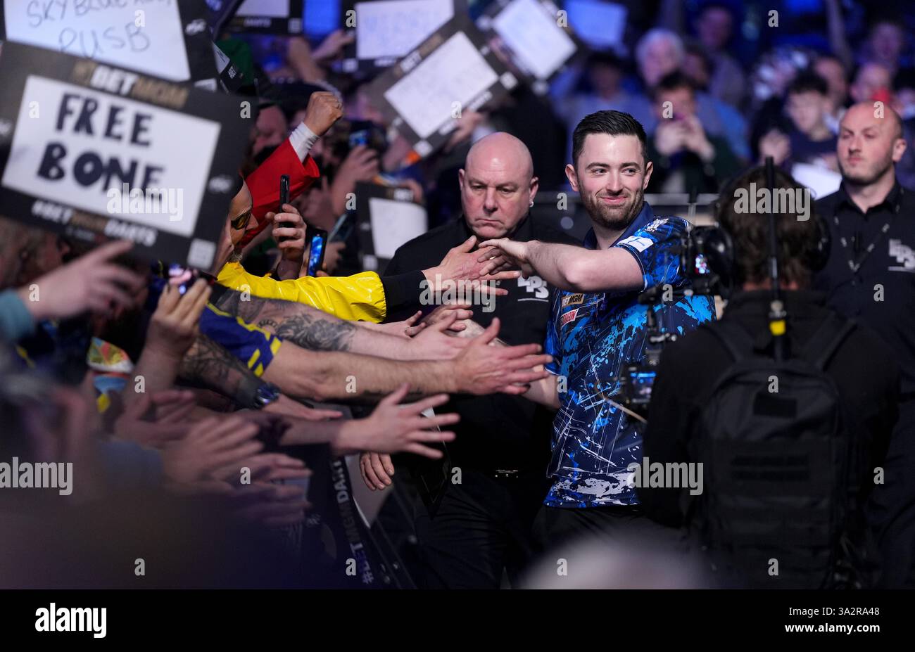 Luke Humphries walks out during night six of the BetMGM Premier League ...