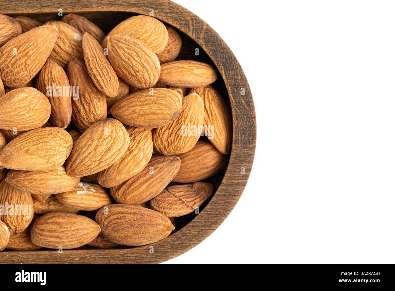 Almond nuts in wooden bowl isolated on white background Stock Photo - Alamy