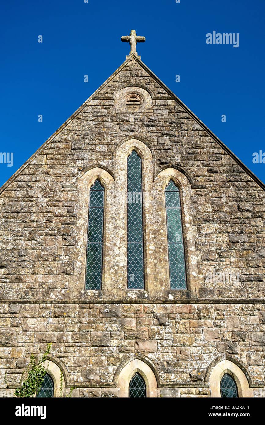 Looking up at three narrow leaded windows in a church Stock Photo - Alamy