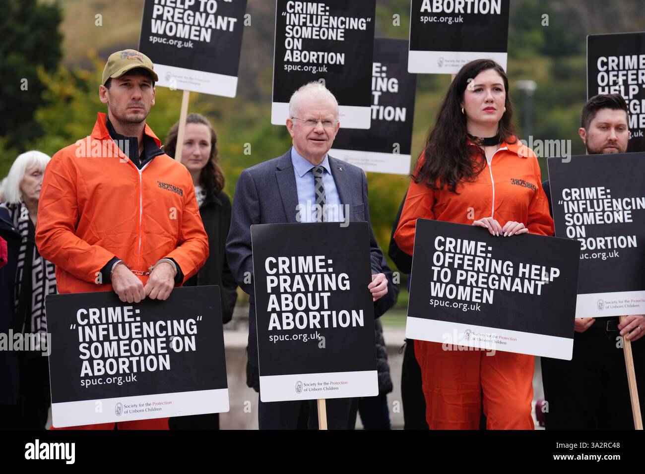 John Mason MSP joins people as they take part in a protest outside the ...