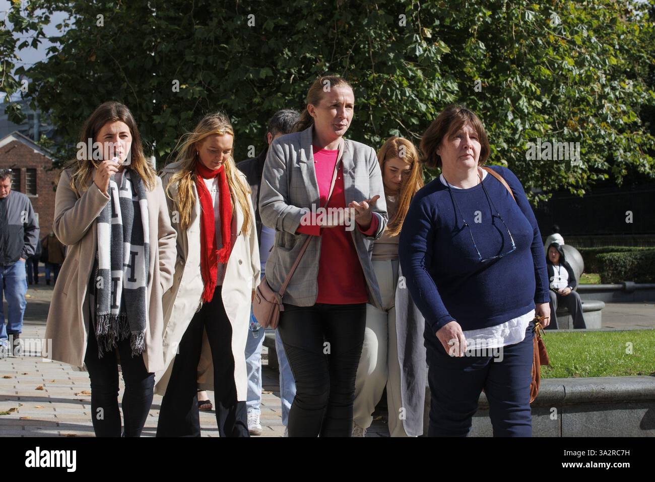 Katie Simpson's mother Noeleen Simpson (right) with family and friends ...