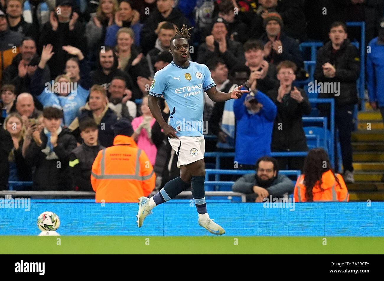 Manchester City's Jeremy Doku celebrates scoring their side's first ...