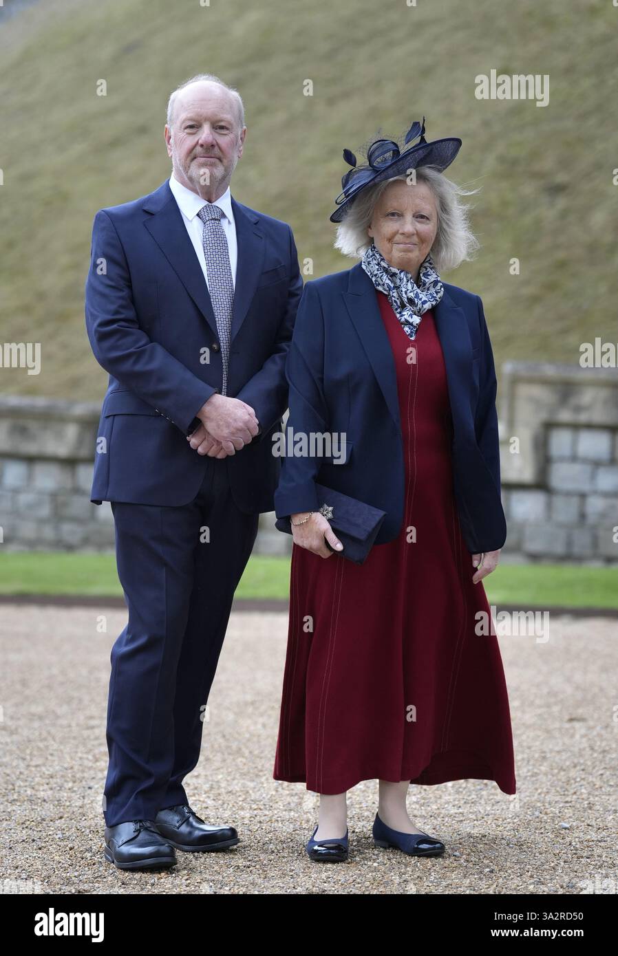 Sir Alan Bates, with his wife Lady Suzanne Sercombe, before he receives ...
