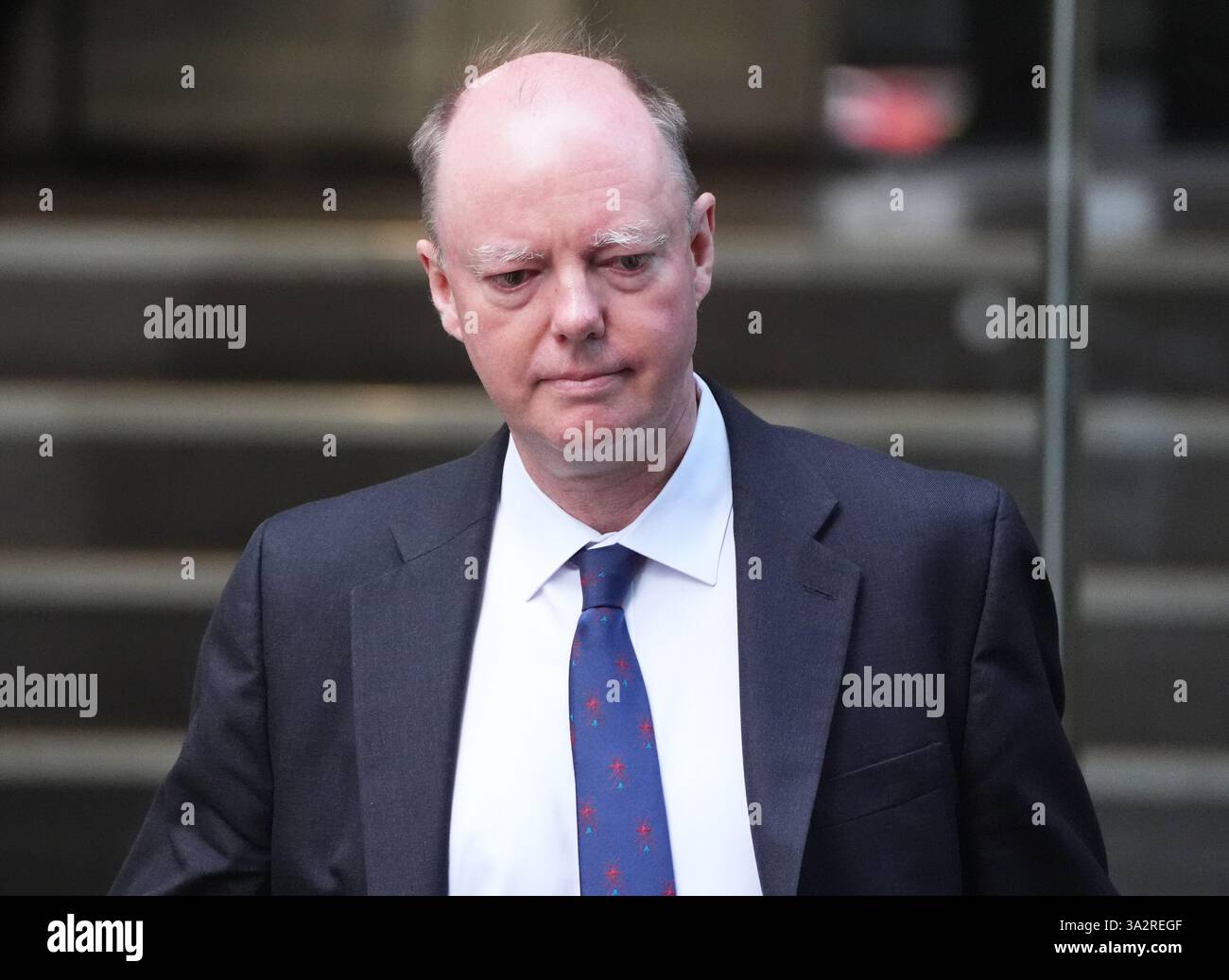 England's chief medical officer Professor Sir Chris Whitty leaves after ...