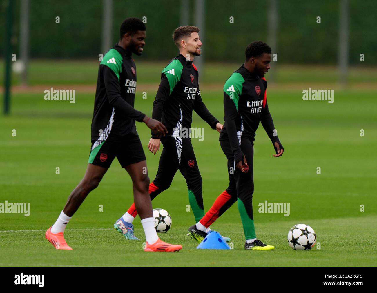 Arsenal's Jorginho (centre) and Arsenal's Thomas Partey (left) during a ...