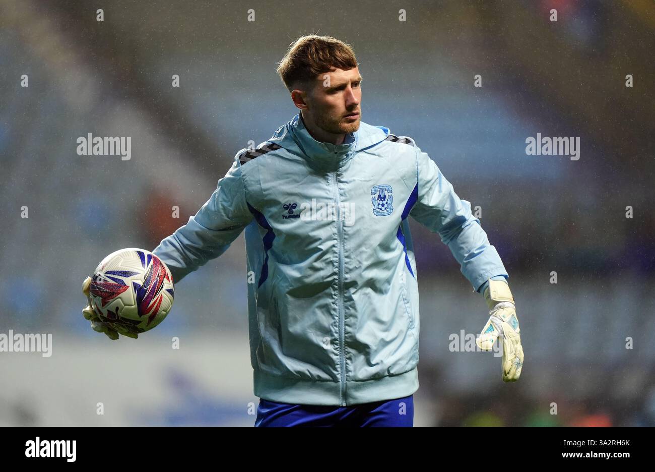 Coventry City goalkeeper Bradley Collins warms up before the Sky Bet ...