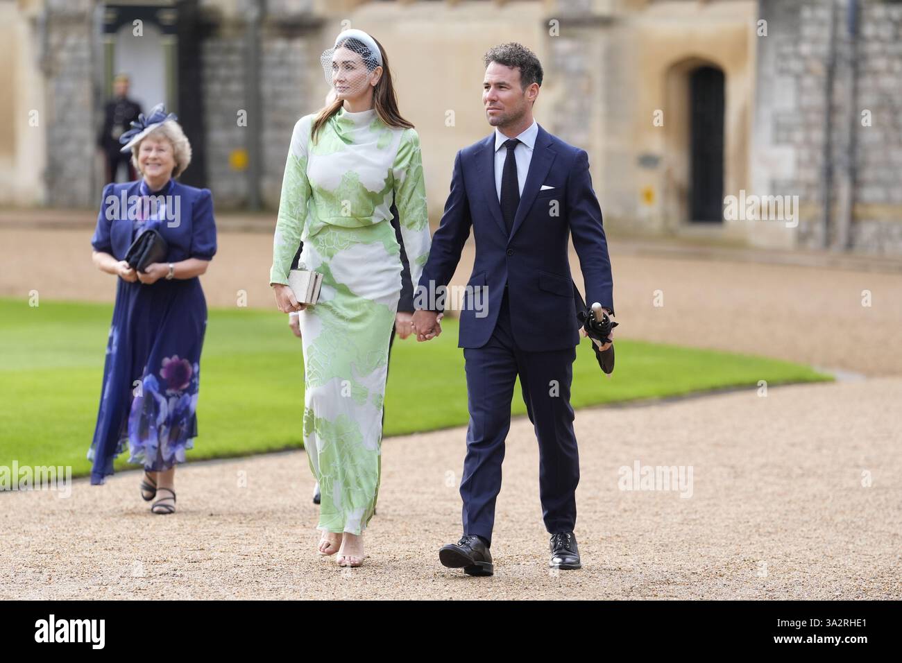 Mark Cavendish with his wife Peta arriving at Windsor Castle, Berkshire ...