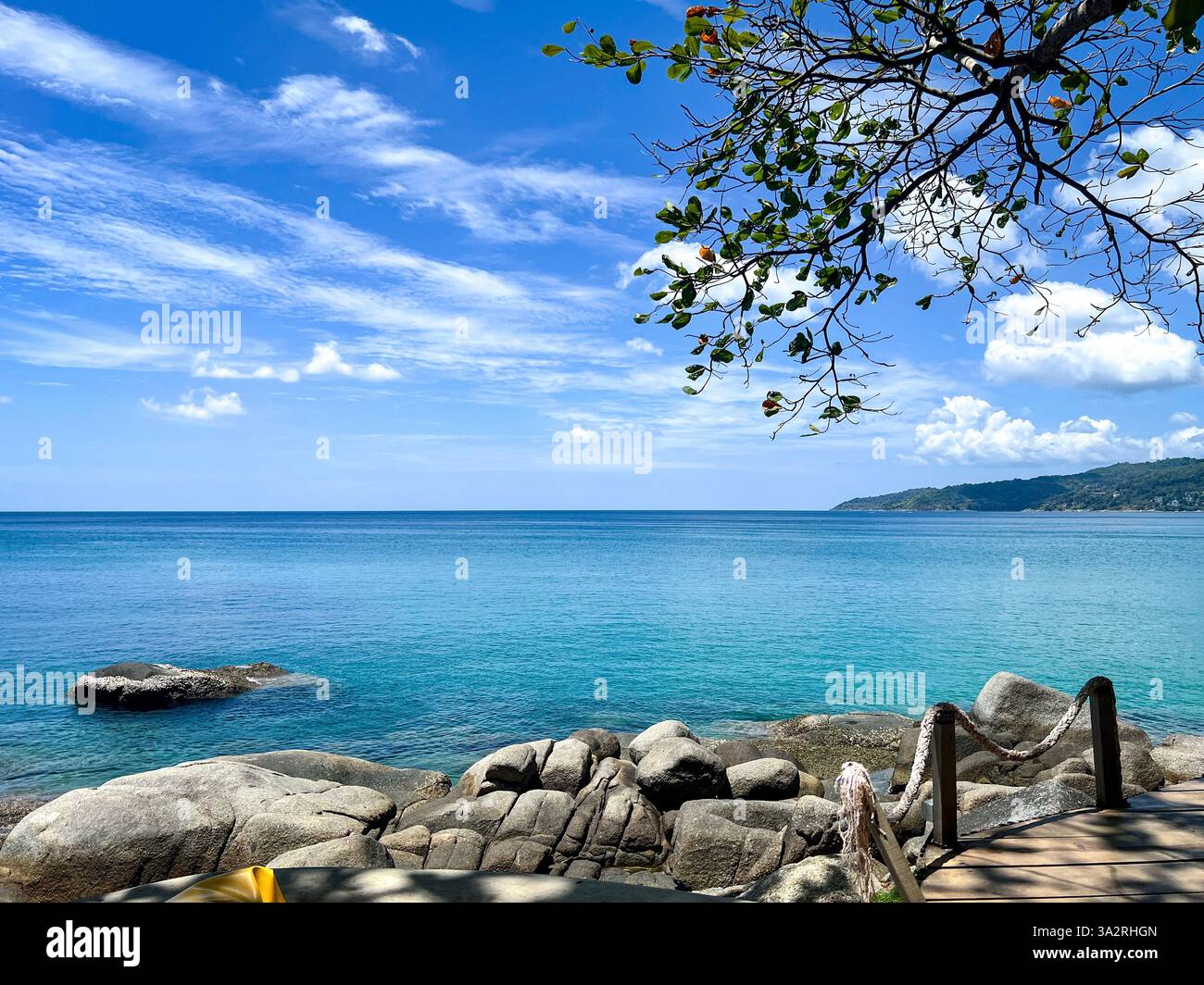 Tropical Beach Paradise with Crystal Clear Water and Rocky Shoreline in ...