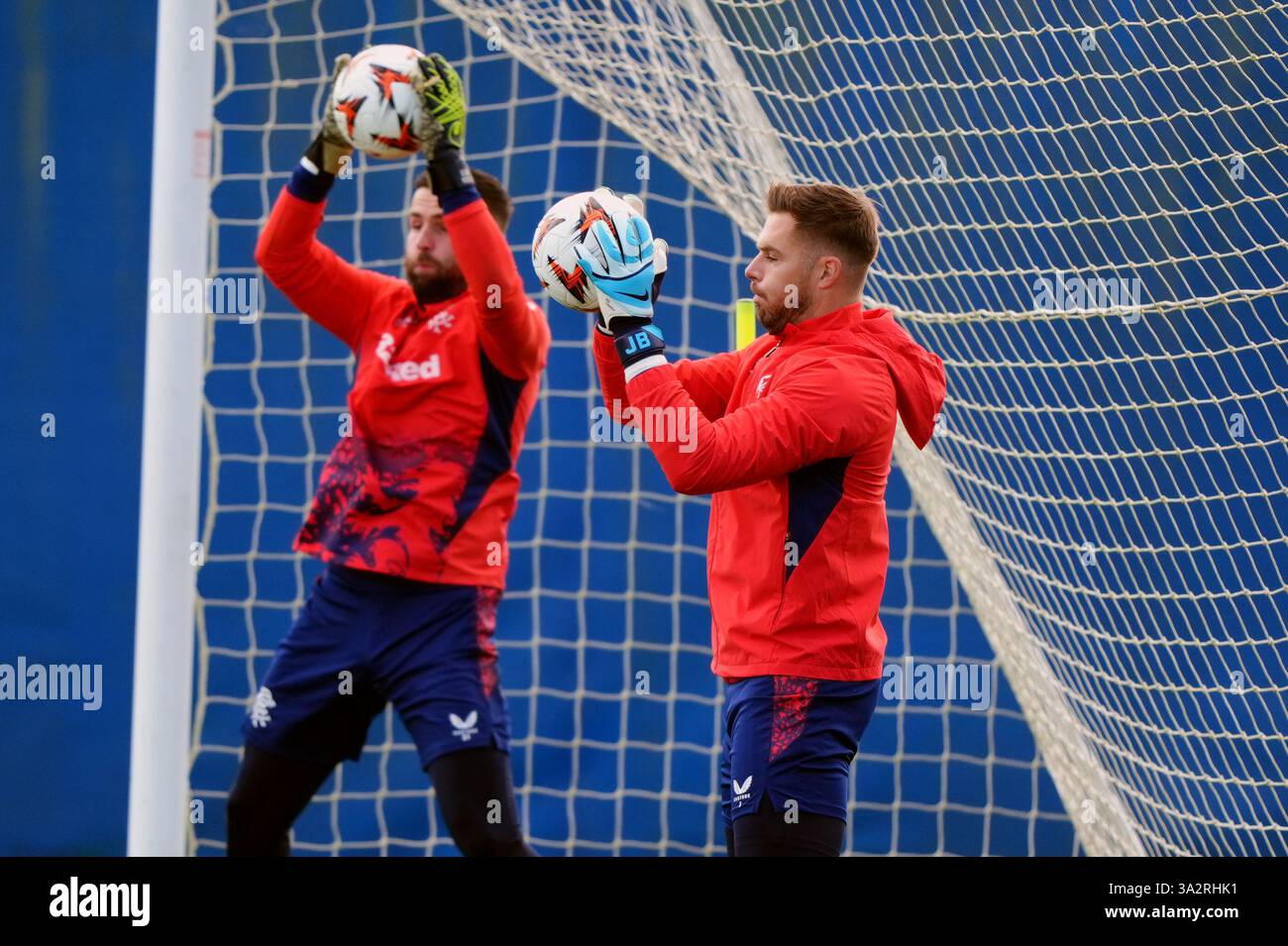 Rangers goalkeeper Jack Butland (right) during a training session at ...
