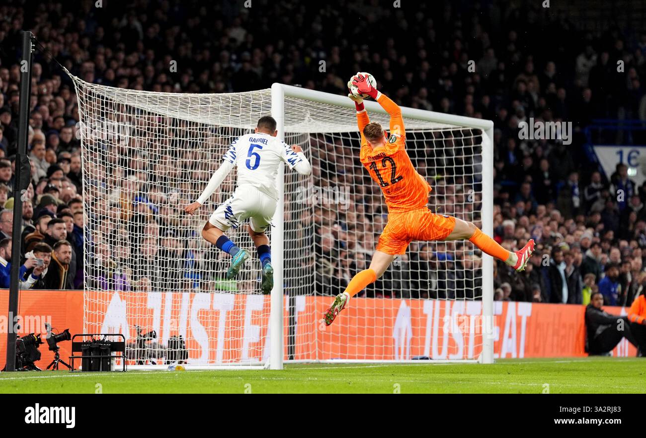 Chelsea goalkeeper Filip Jorgensen makes a save during the UEFA ...