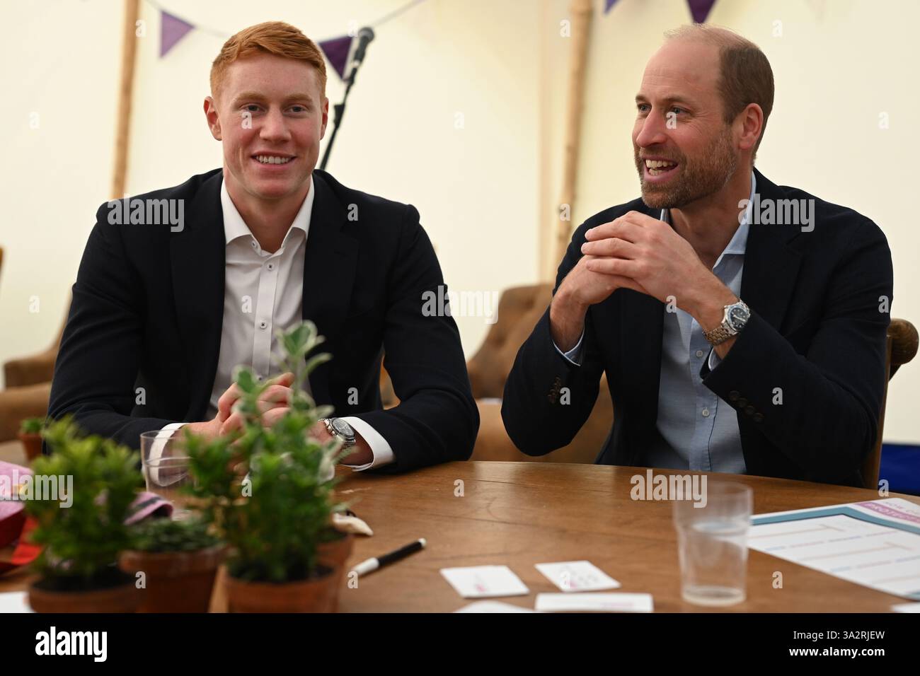 The Prince of Wales speaks with British Olympian Tom Dean (left) during ...