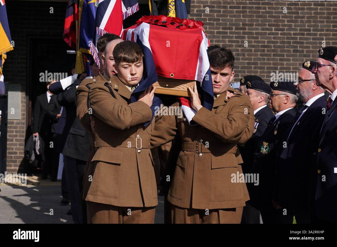 Veterans stand guard as members of the military carry the coffin from ...