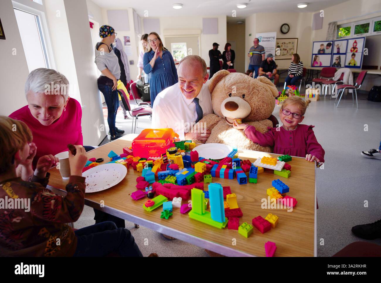 Liberal Democrats leader Sir Ed Davey with three-year-old Alice Fry ...