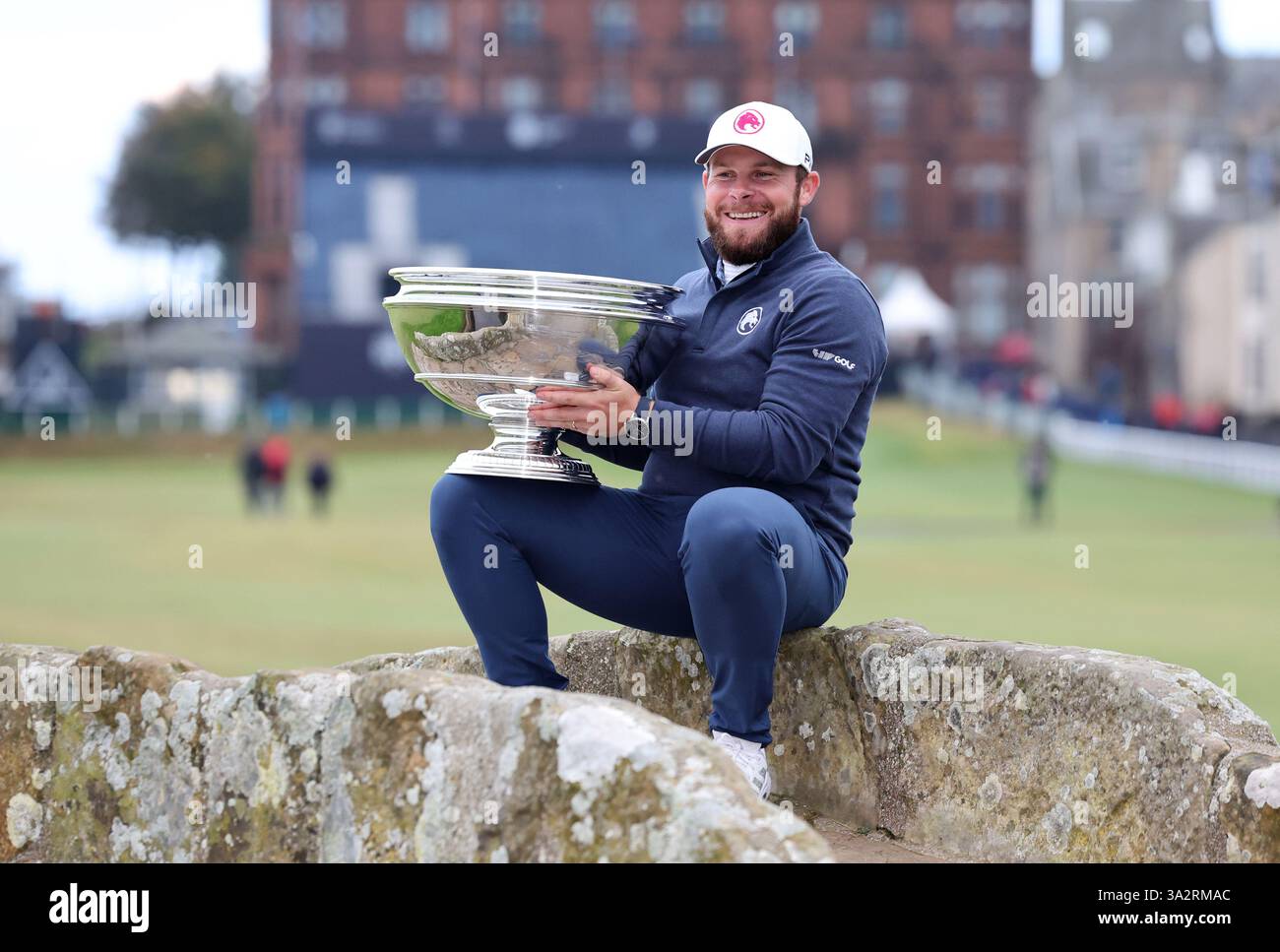 Tyrrell Hatton celebrates with the trophy after winning on day Four of ...