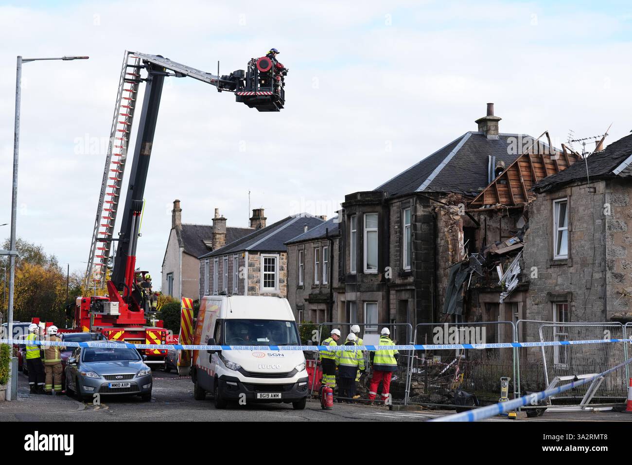 Fire investigators at the scene at Kellie Place in Alloa ...