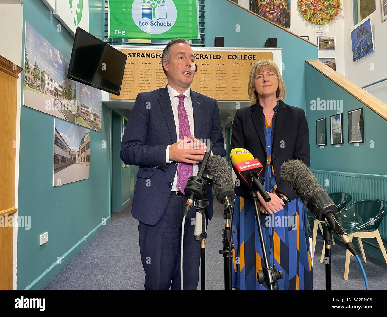 Northern Ireland's Education Minister Paul Givan and principal Clare ...
