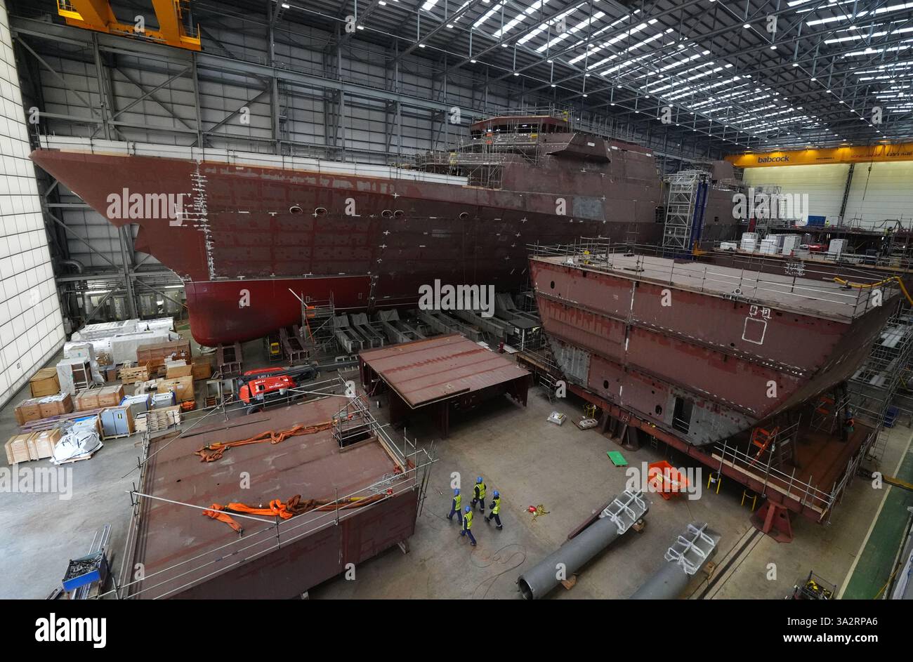 Construction work continues on HMS Venturer(left) and HMS Active in the ...