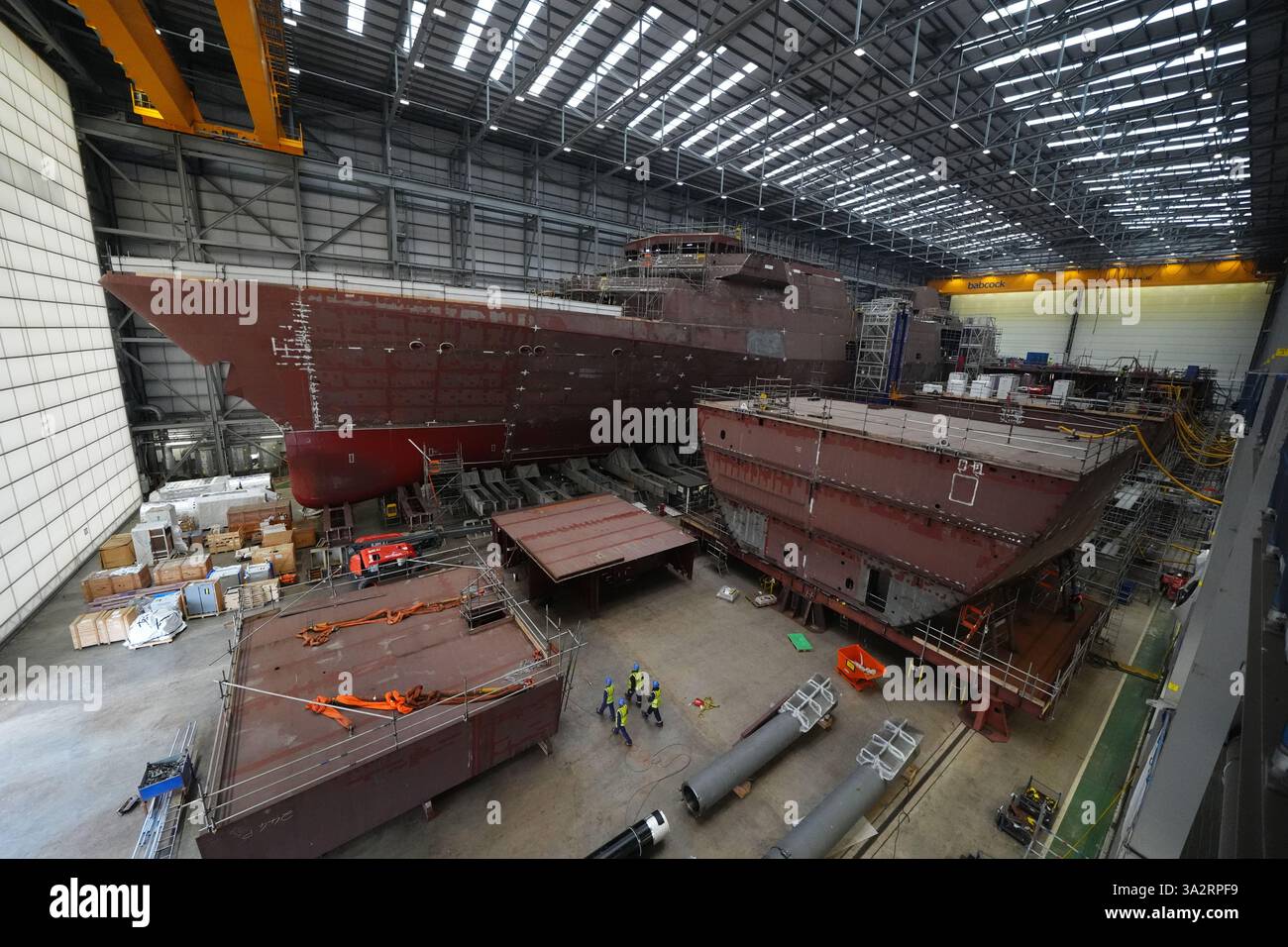 Construction work continues on HMS Venturer(top) and HMS Active in the ...
