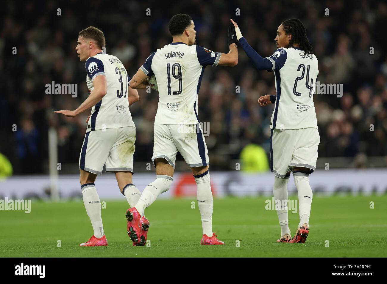 Tottenham's Micky van de Ven, Dominic Solanke and Djed Spence celebrate ...