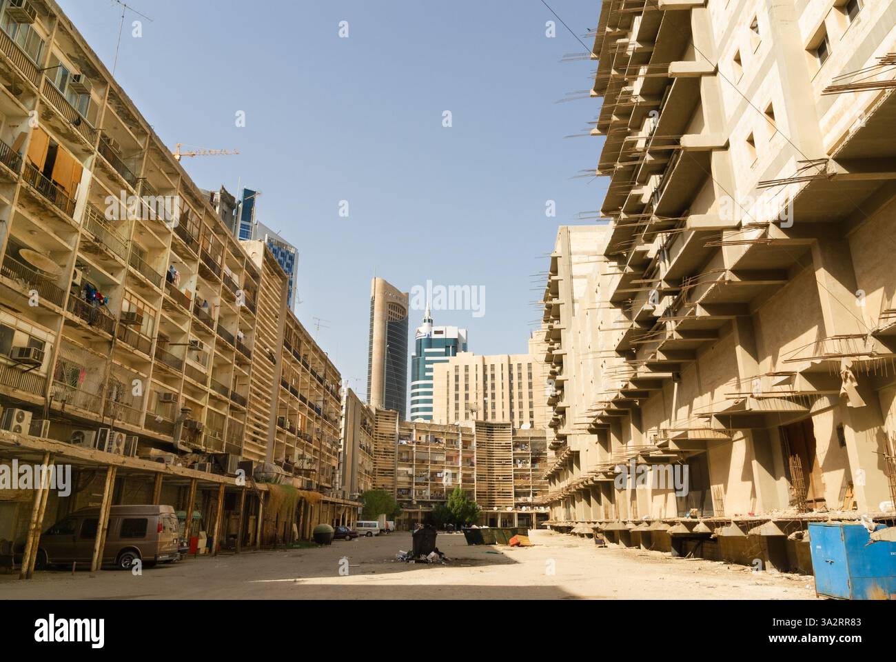 Kuwait City, Kuwait — September 1, 2007: Modern buildings and poor ...