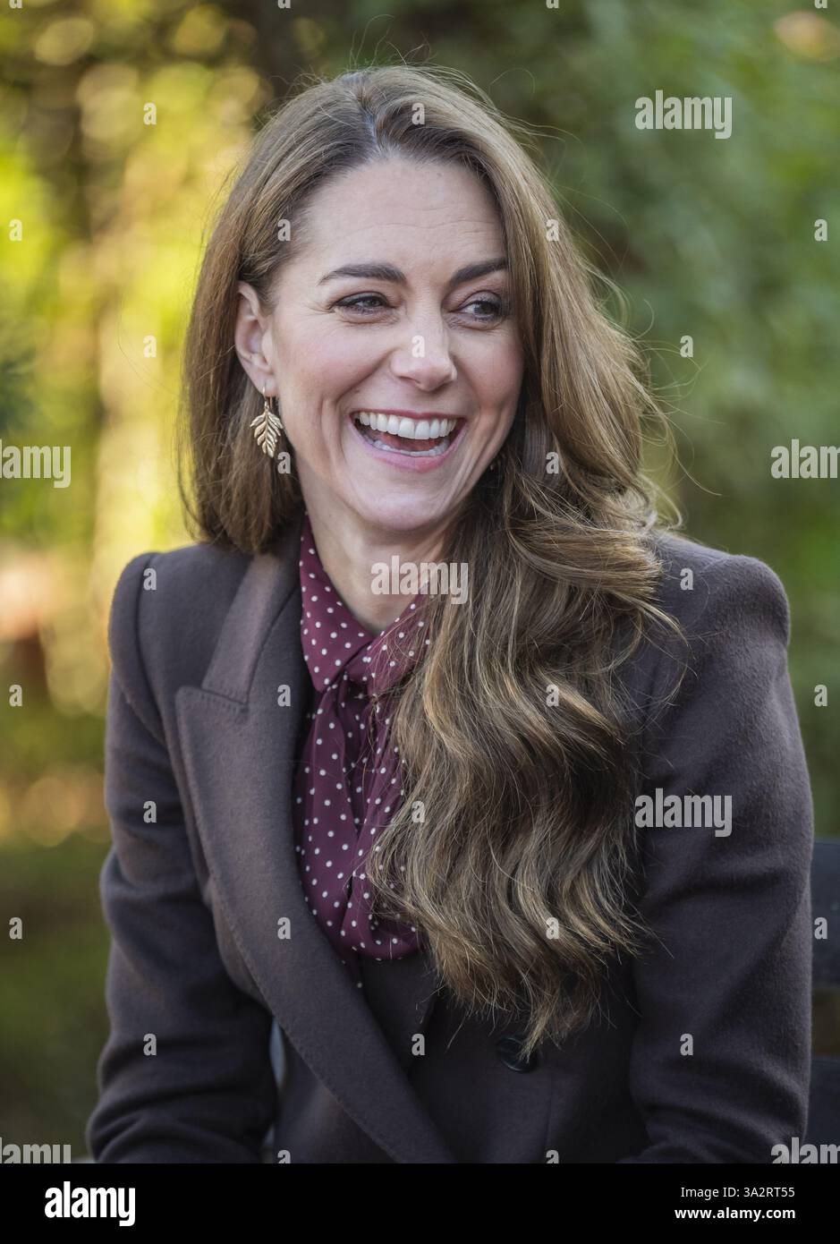 The Princess of Wales laughs as she speaks with members of the ...
