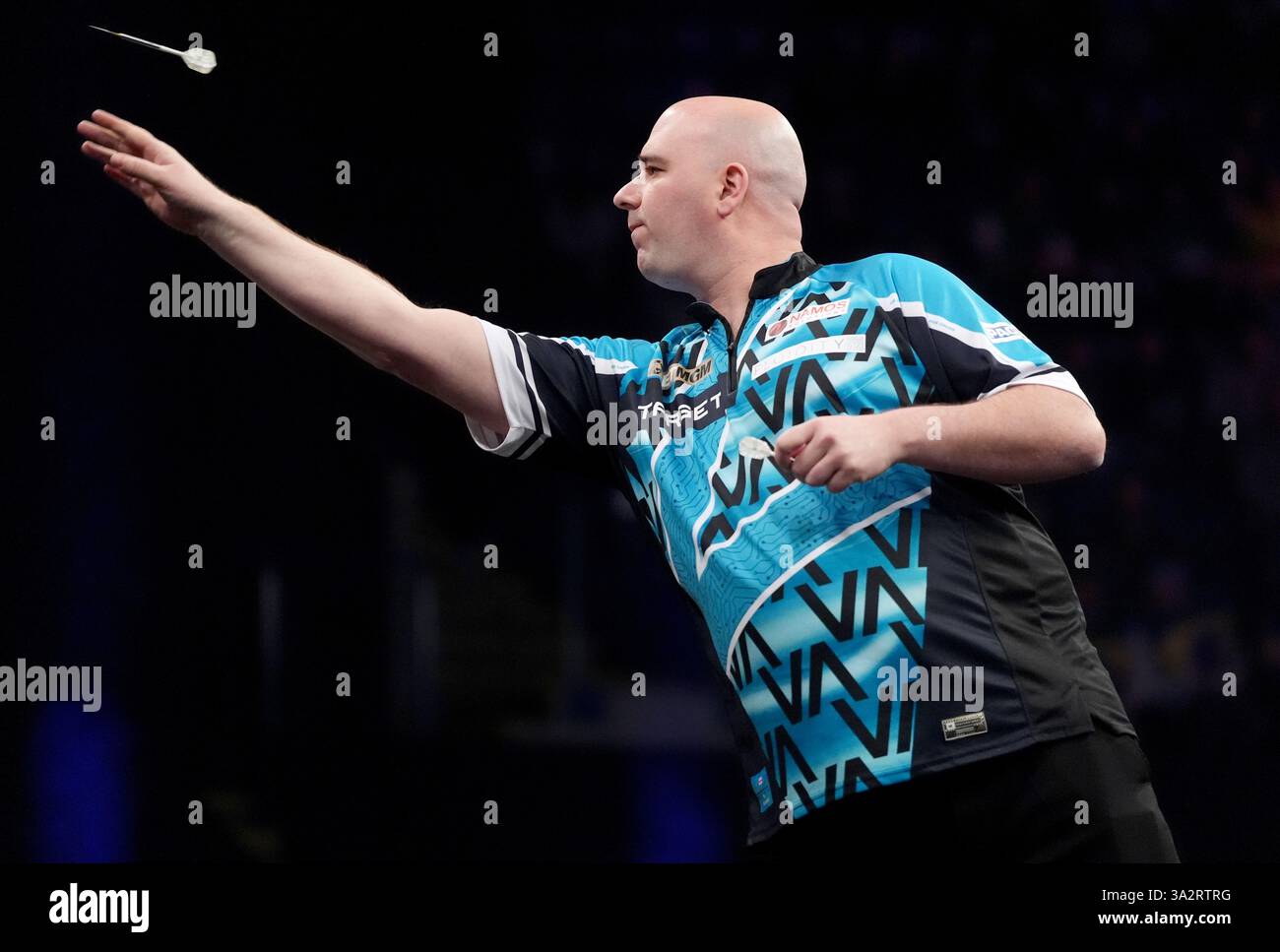 Rob Cross in action against Chris Dobey during night six of the BetMGM ...