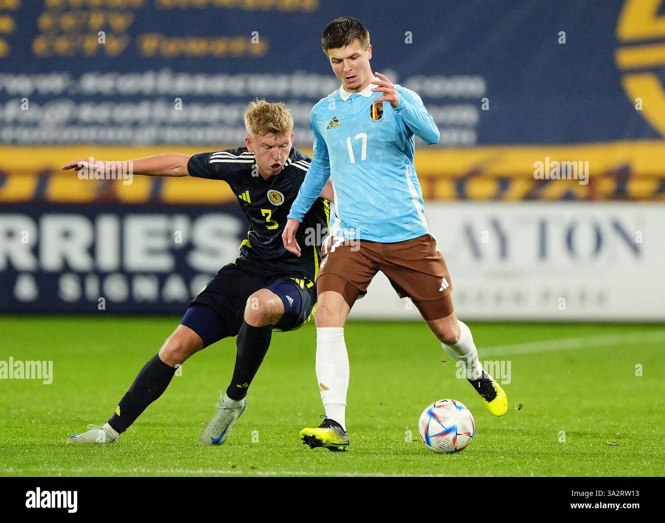 Belgium's Jarne Steuckers (right) and Scotland's Josh Doig battle for ...