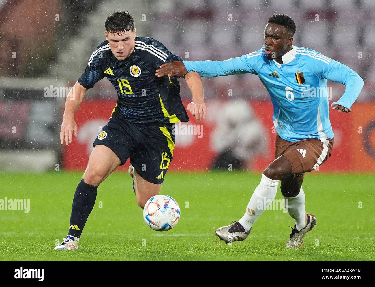 Scotland's Josh Mulligan (left) and Belgium's Mandela Keita battle for ...