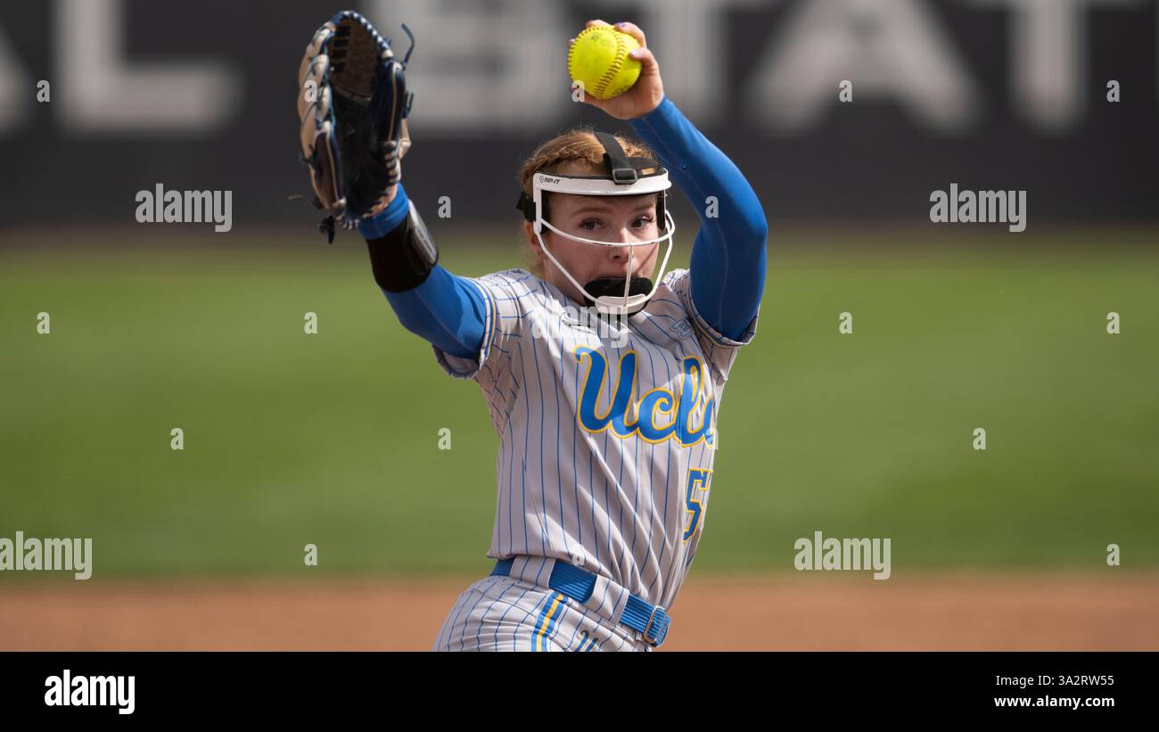 UCLA starting pitcher Kaitlyn Terry delivers a pitch during an NCAA ...
