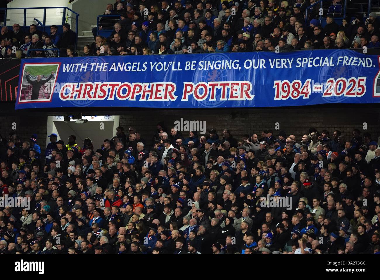 Rangers fans with a tribute to fan Christopher Potter who died in ...