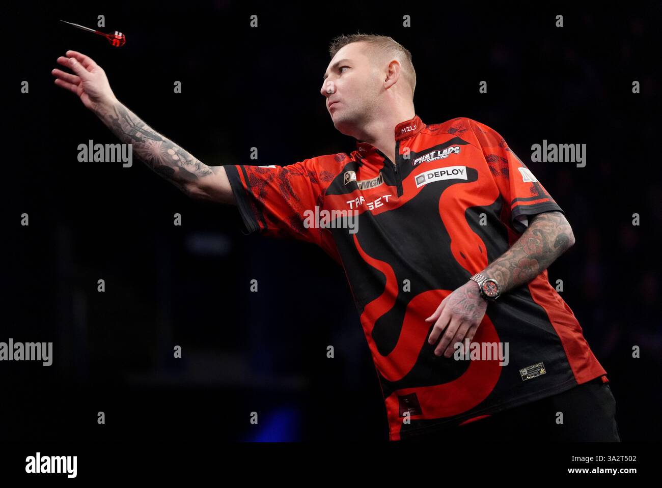 Nathan Aspinall in action against Michael van Gerwen during night six ...