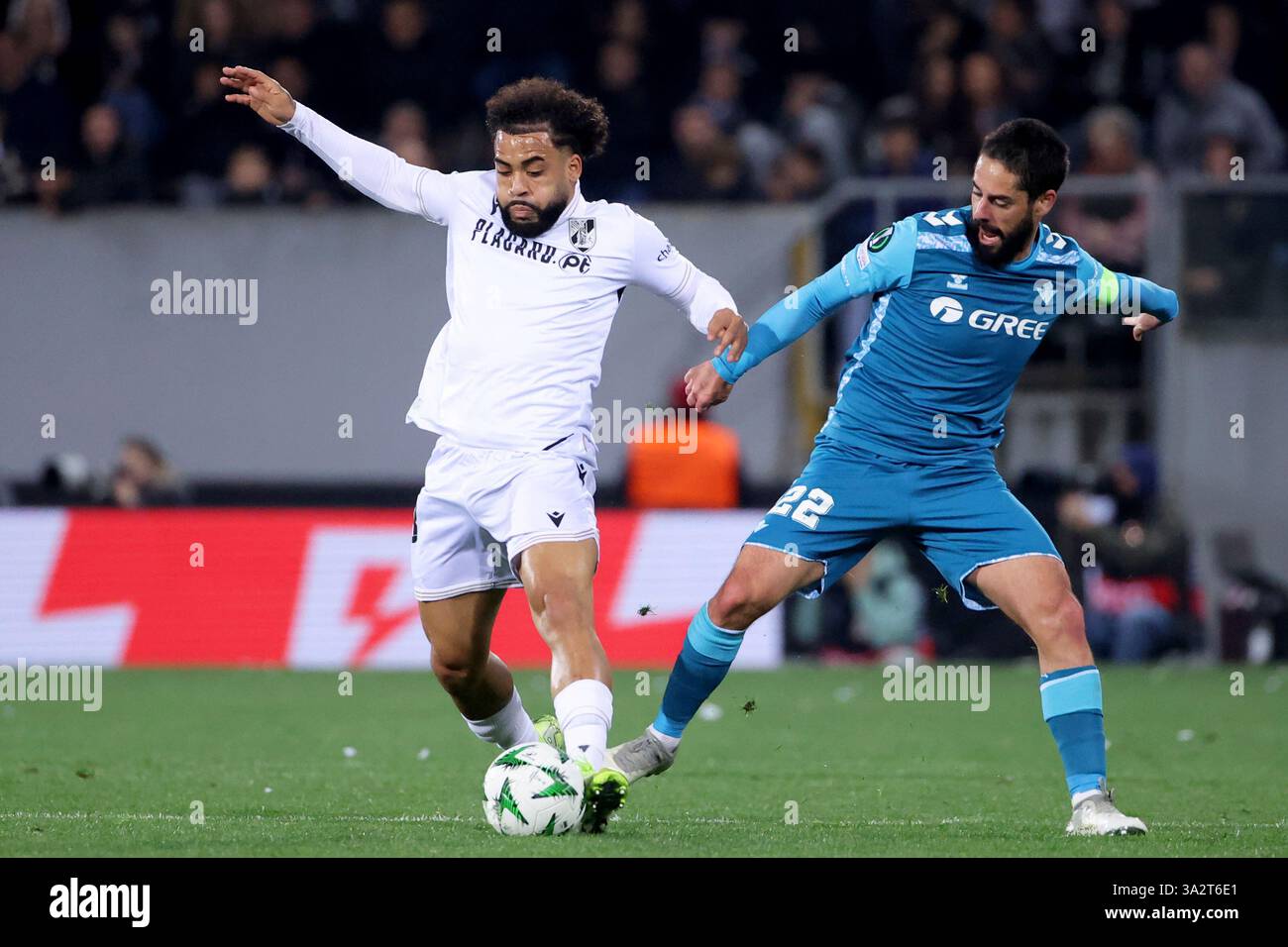 Betis' Isco vies for the ball with Vitoria's Telmo Arcanjo, left ...