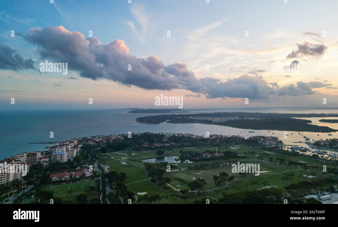 Sunrise aerial view of Fisher island, Miami. Miami beach with ...