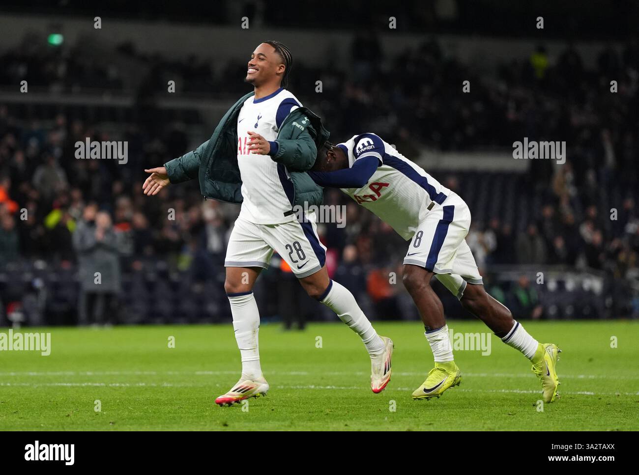 Tottenham Hotspur's Wilson Odobert (left) and Yves Bissouma celebrate ...