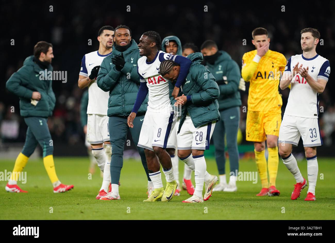 Tottenham Hotspur's Yves Bissouma (left) and Wilson Odobert celebrate ...