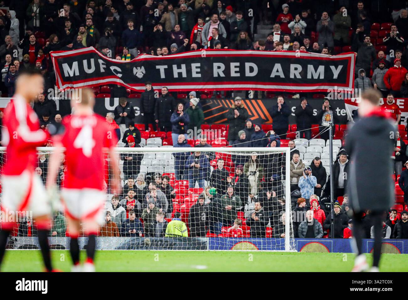 Manchester, UK. 13th Mar, 2025. Red Army banner flag during the ...