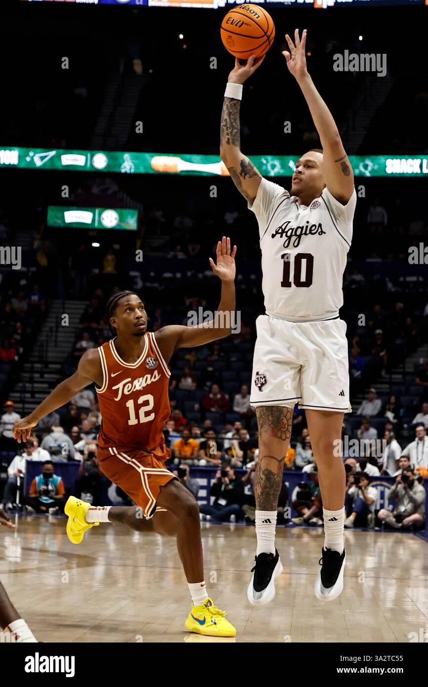 Texas A&M guard CJ Wilcher (10) shoots a three-point shot against Texas ...