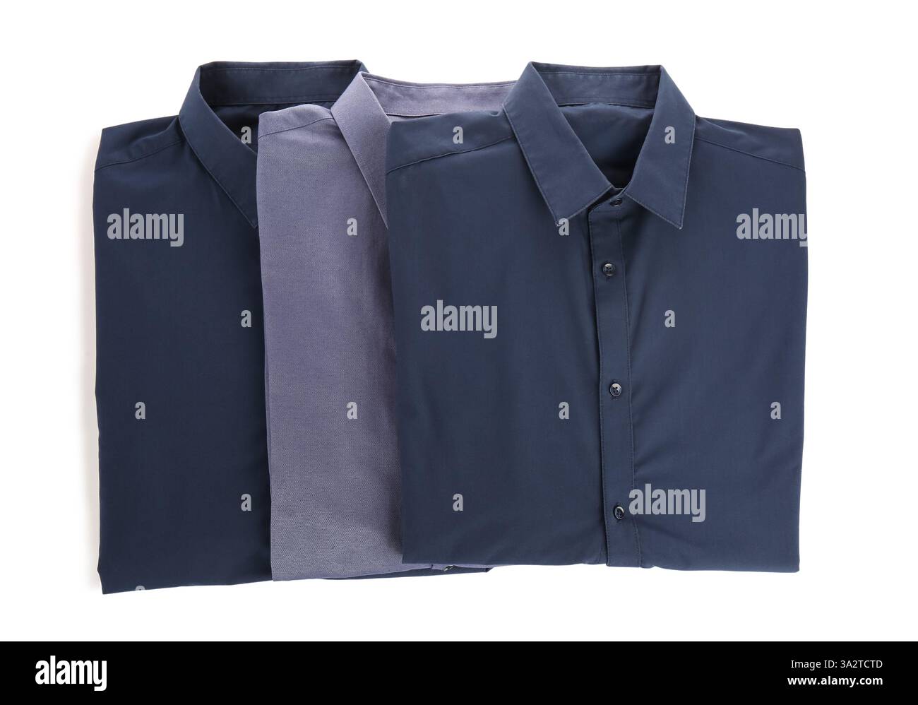 Stylish folded collar shirts on white background Stock Photo - Alamy