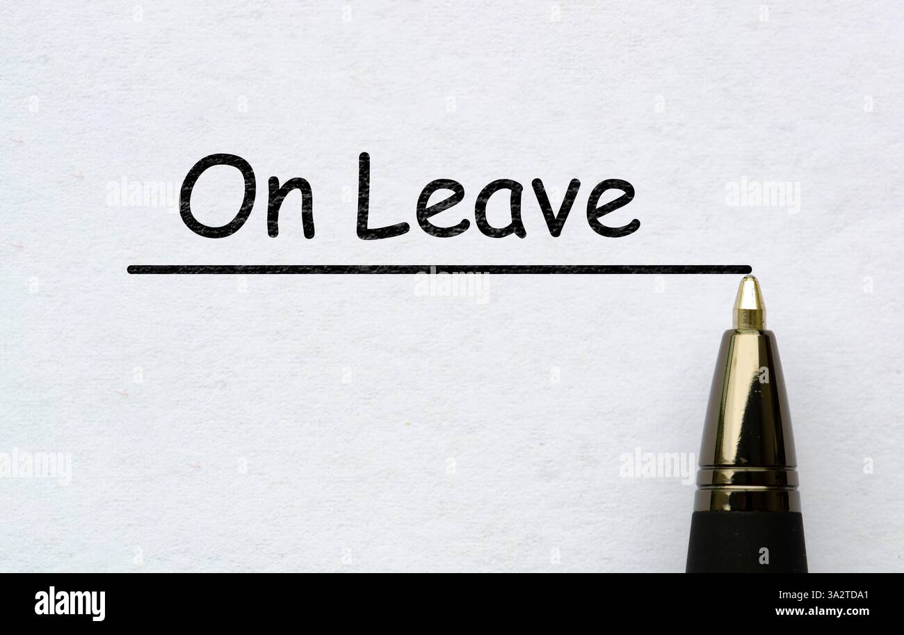 On leave text written on white paper. Vacation concept Stock Photo - Alamy