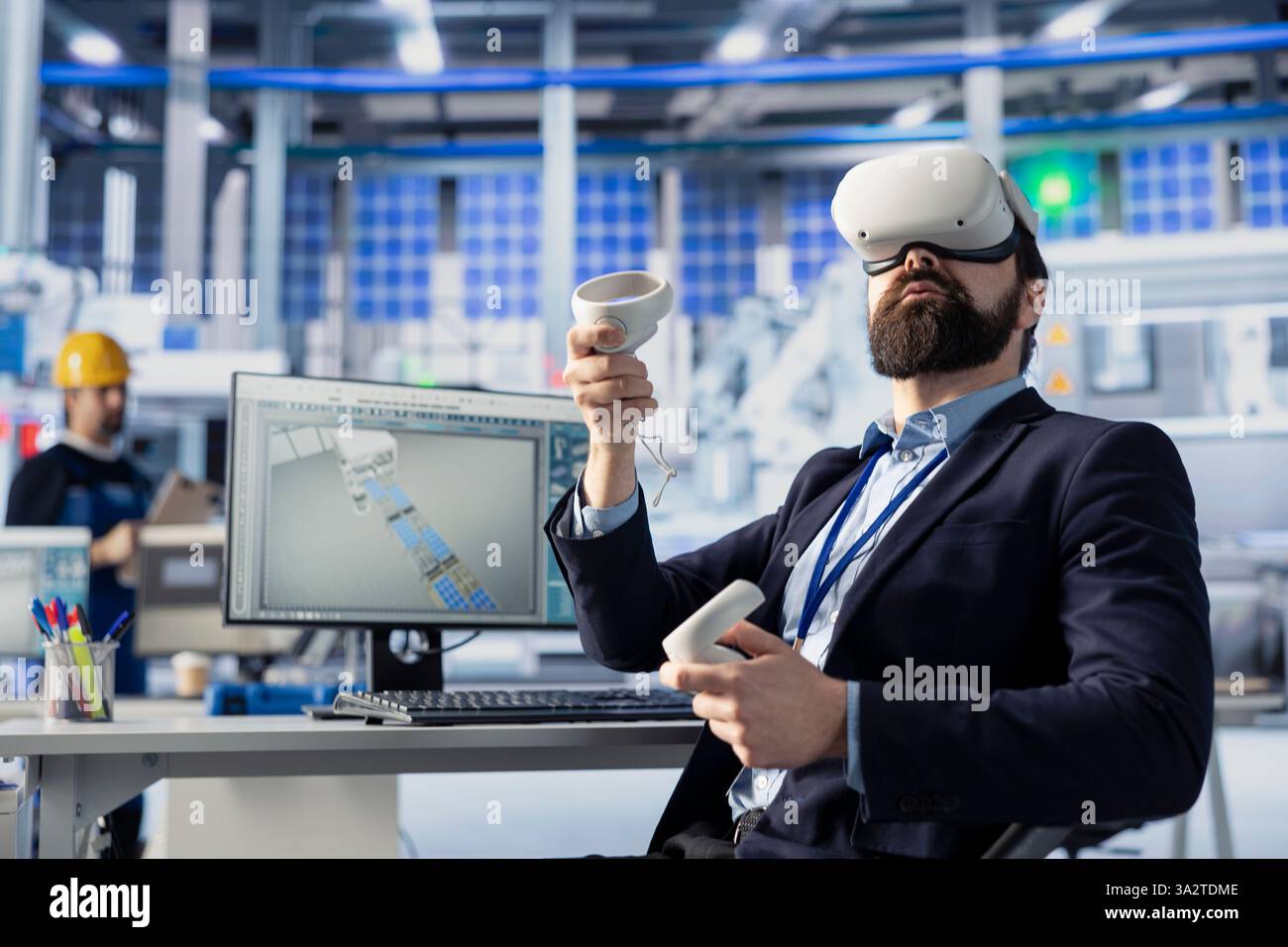 Photovoltaics factory worker using VR technology to analyze and modify ...