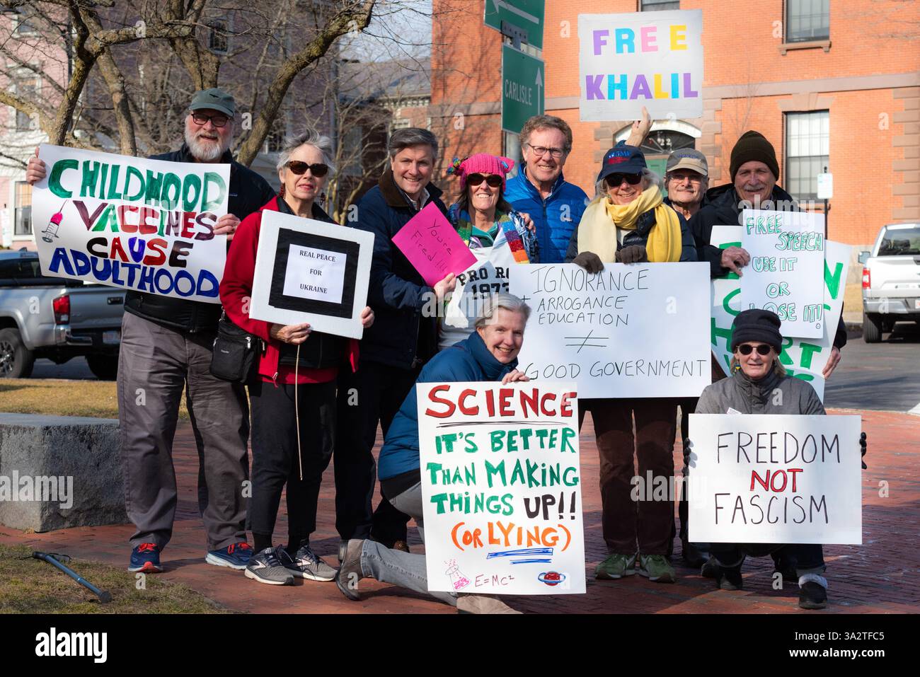 A group organized by Concord Indivisible, rallying in Concord Center ...