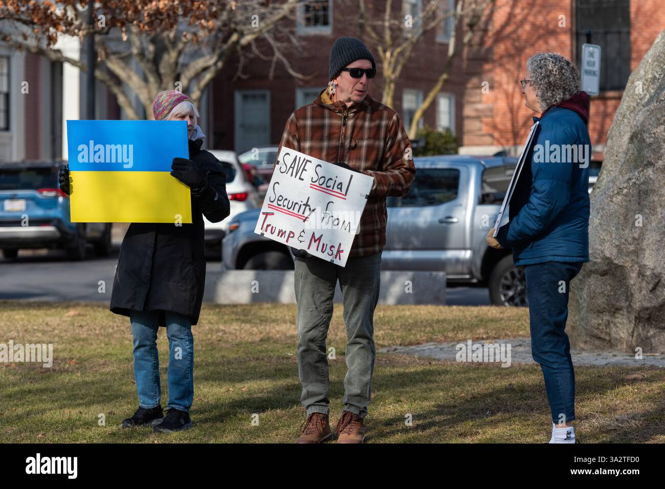 A group organized by Concord Indivisible, rallying in Concord Center ...