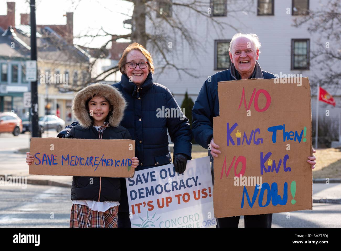 A group organized by Concord Indivisible, rallying in Concord Center ...