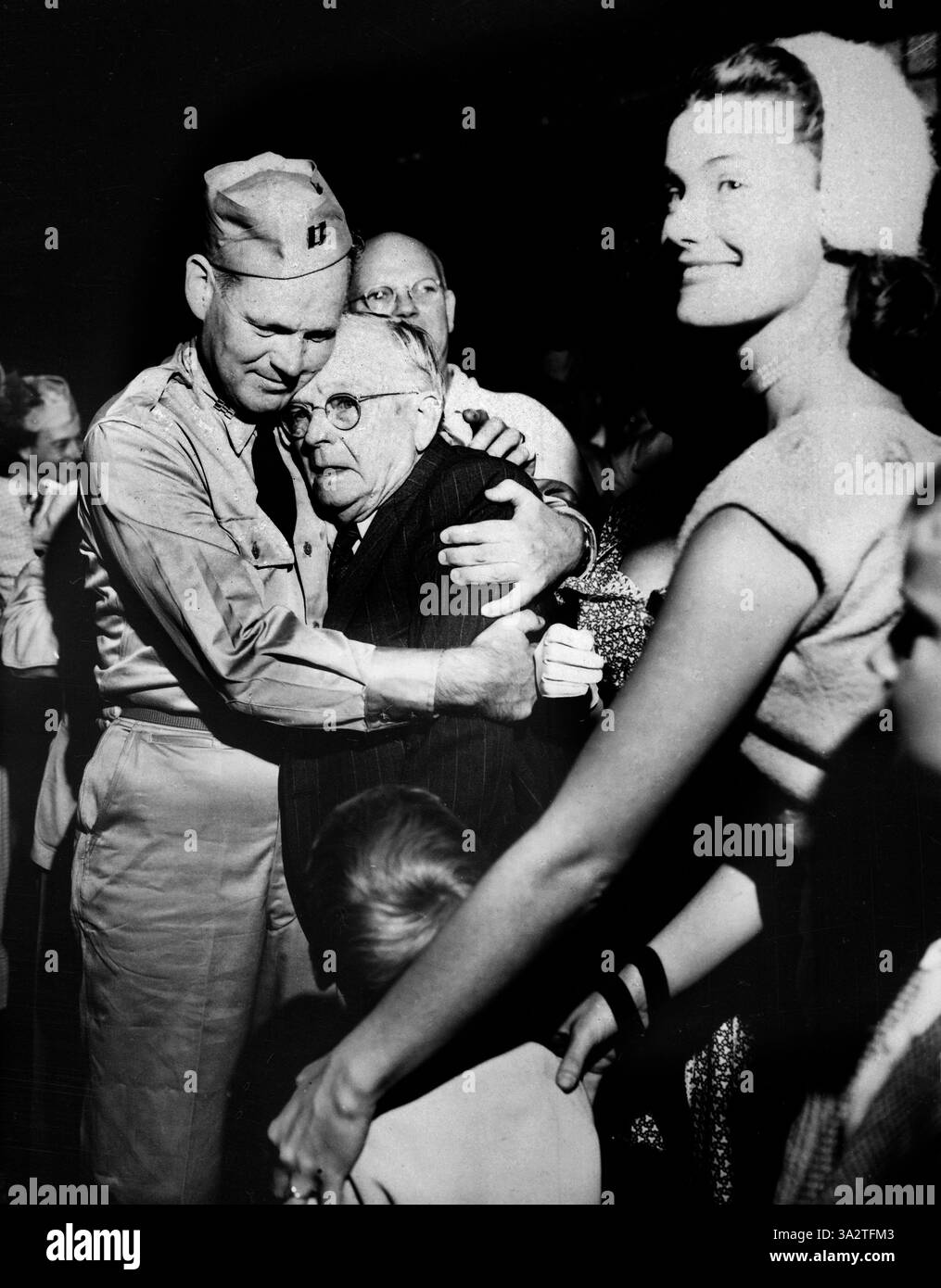 Repatriated Prisoner of War Captain, Frederick Smith is greeted by his ...