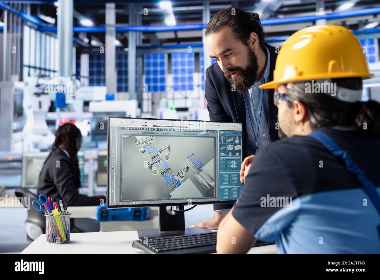 Manager in office ensuring worker hi-res stock photography and images ...