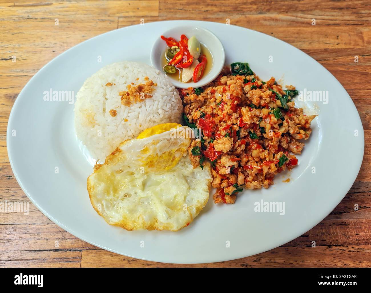 Spicy Basil Fried Chicken or Pad Krapow Gai with steamed rice and a ...