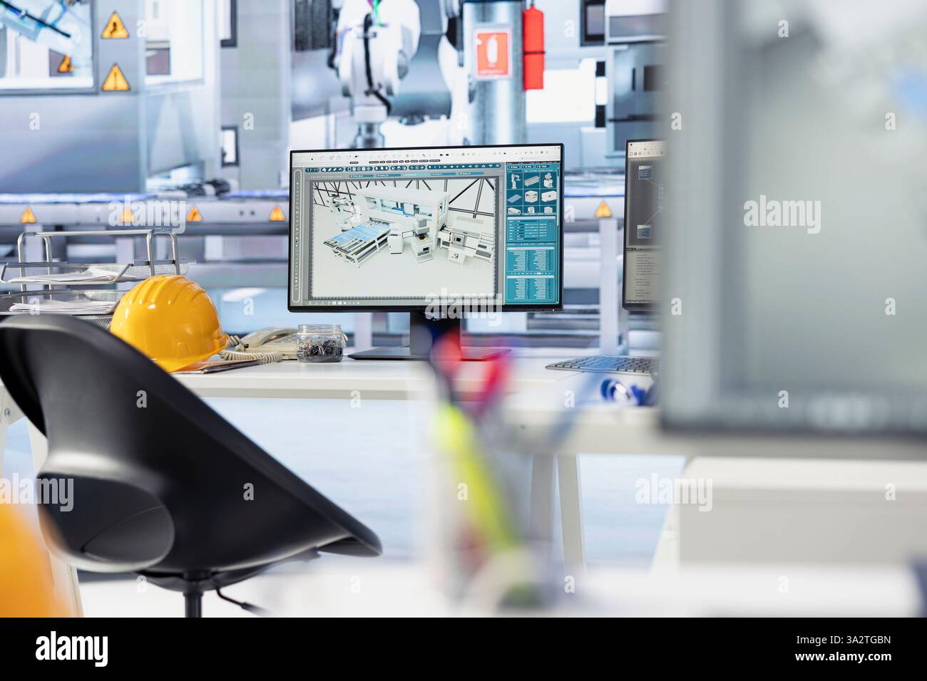 PC screen on desk in photovoltaics factory used to update software of ...