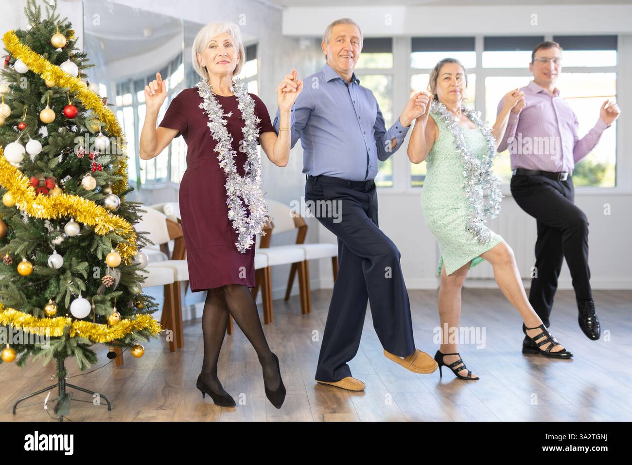 Group of men and women dancing folk dance Stock Photo - Alamy