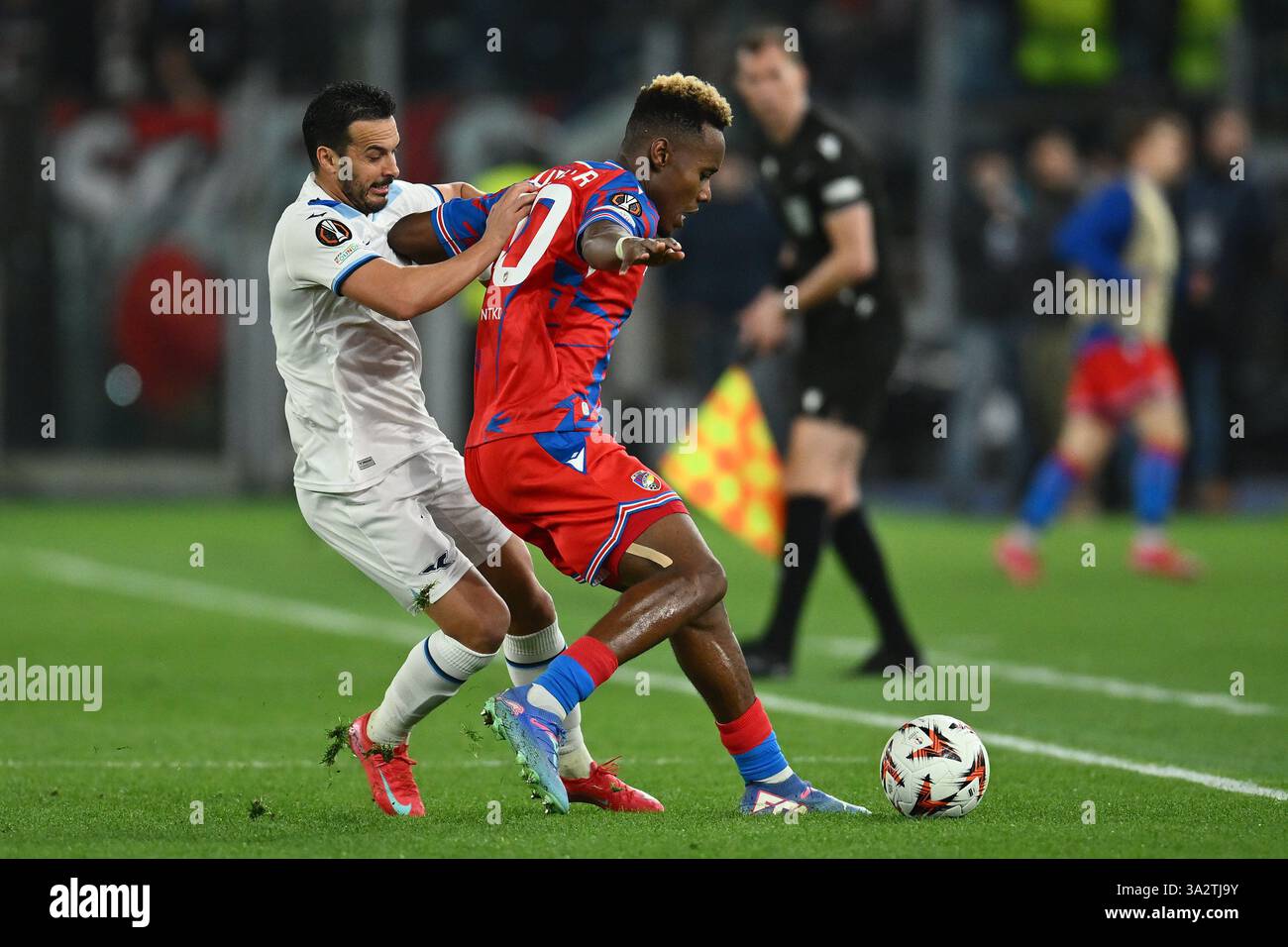 Rome, Italy. 13th Mar, 2025. Pedro of S.S. Lazio and Sampson Dweh of F ...