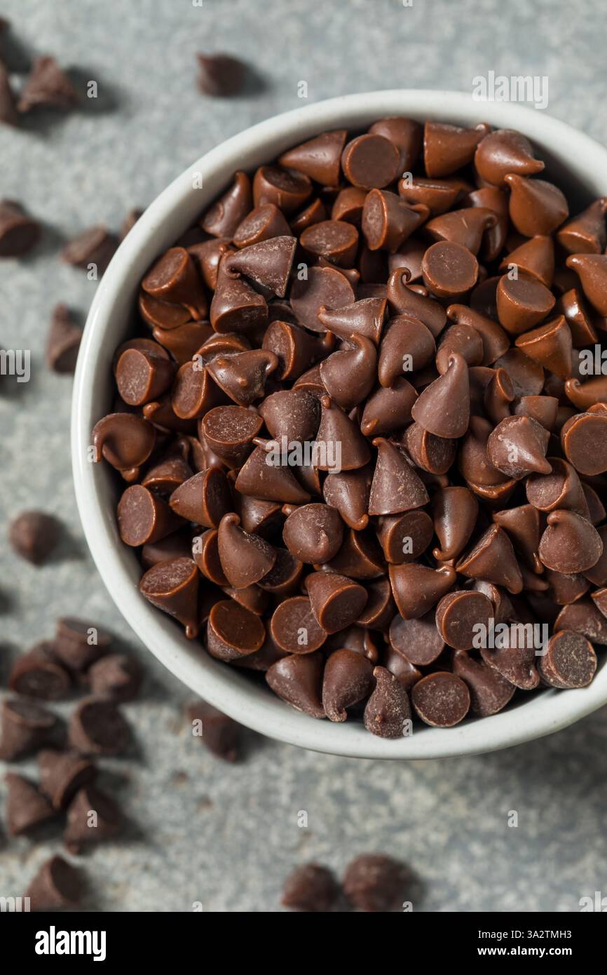 Organic Raw Mini Chocolate Chips in a Bowl Stock Photo - Alamy